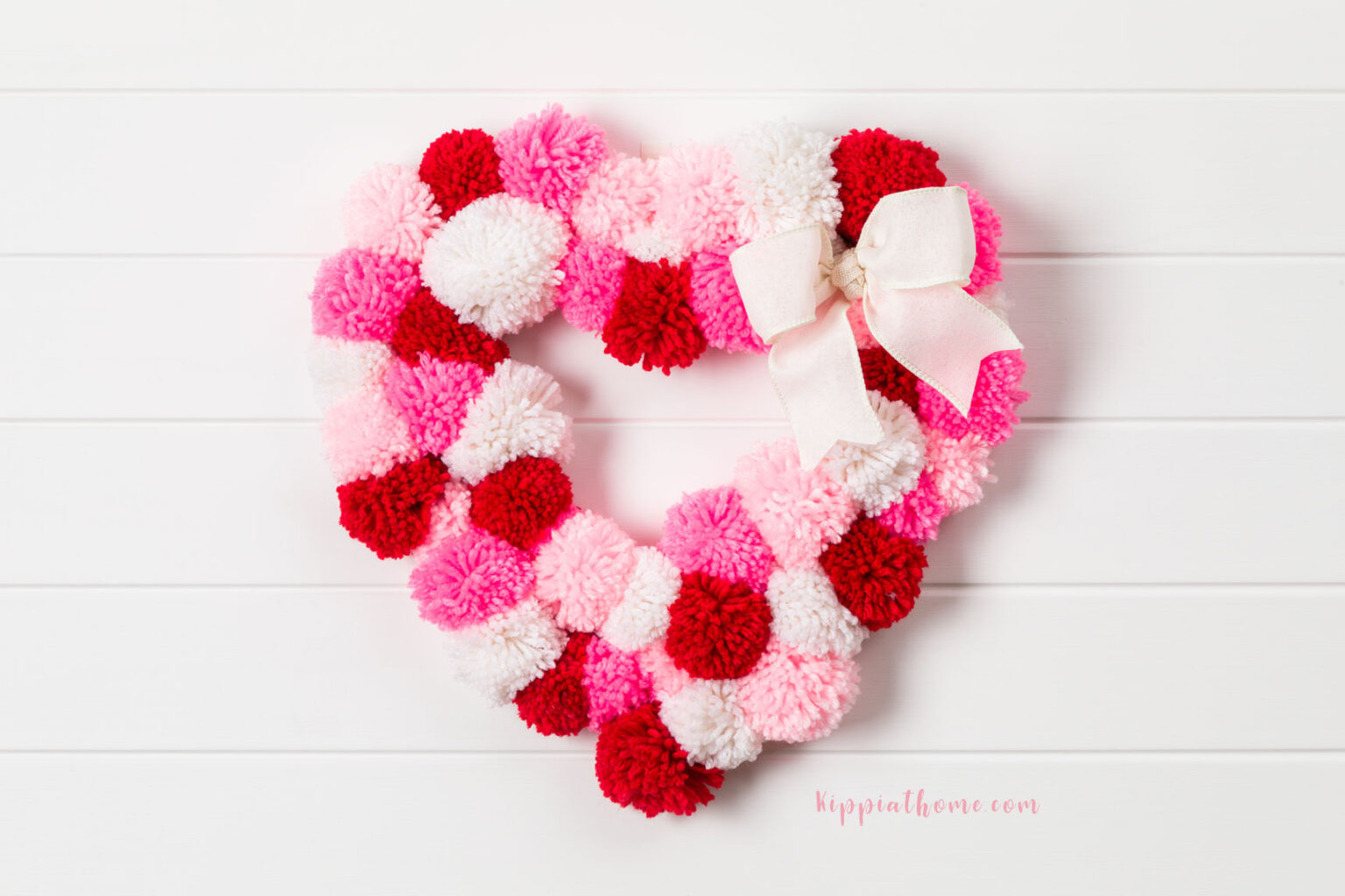 DIY Valentine’s Pom Pom Wreath - Kippi at Home